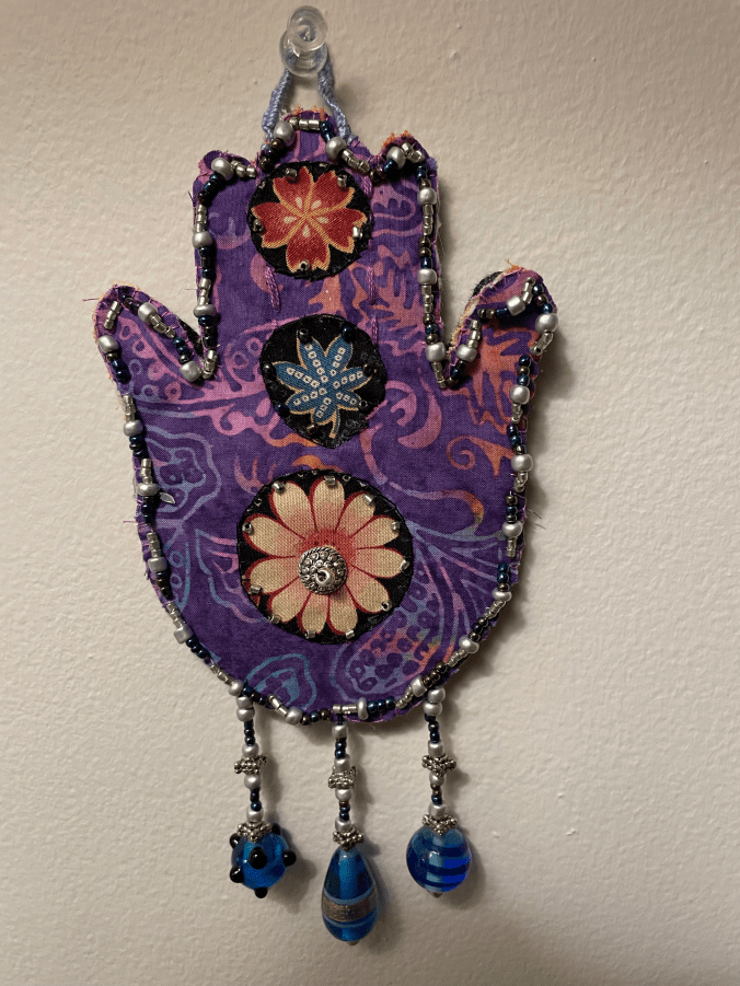 The Hamsa Hand: Symbol of Protection | Tangled Magic
